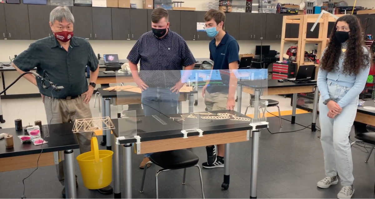 Principles of Engineering Students Test Bridge Design and Efficiency